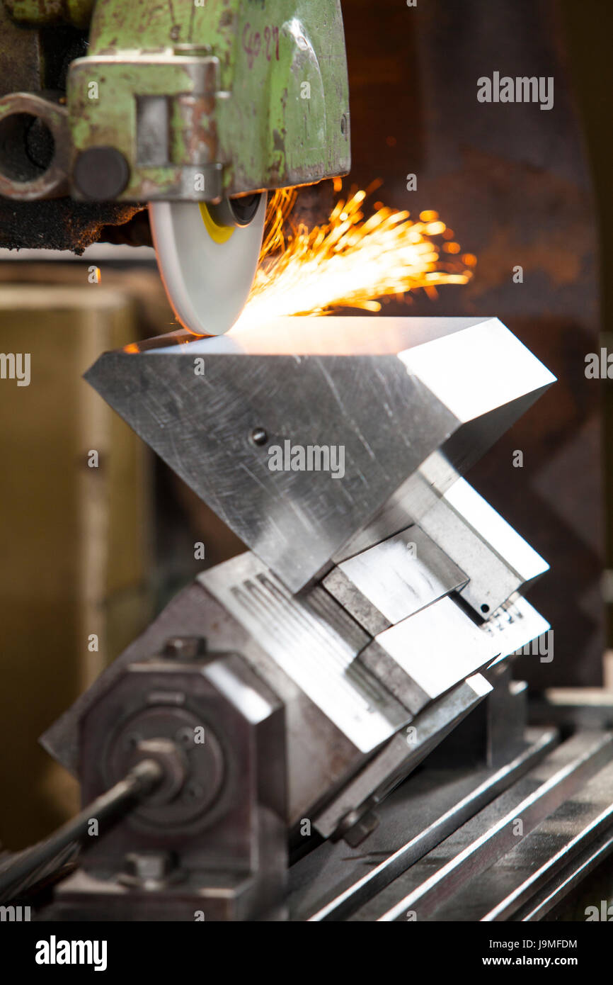 metalworking industry. finishing metal surface on horizontal grinder ...
