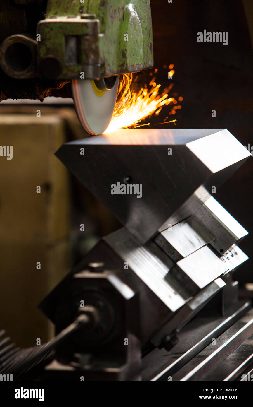 metalworking industry. finishing metal surface on horizontal grinder ...