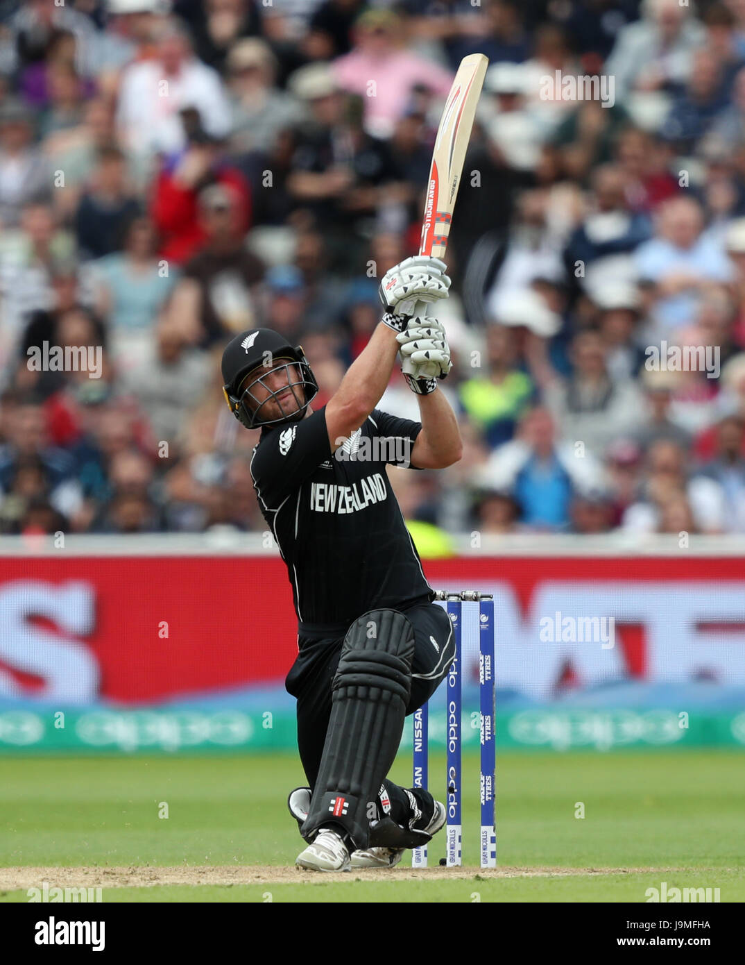 New Zealand's Neil Broom tries to hit out but is caught on the boundary ...