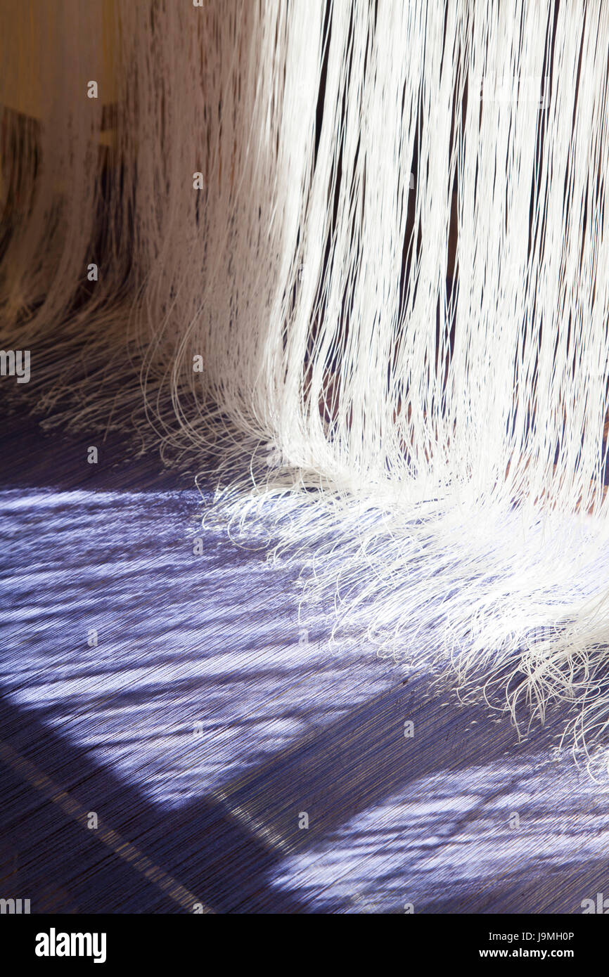 Yarn background, old weaving Loom and thread of yarn. A traditional ...