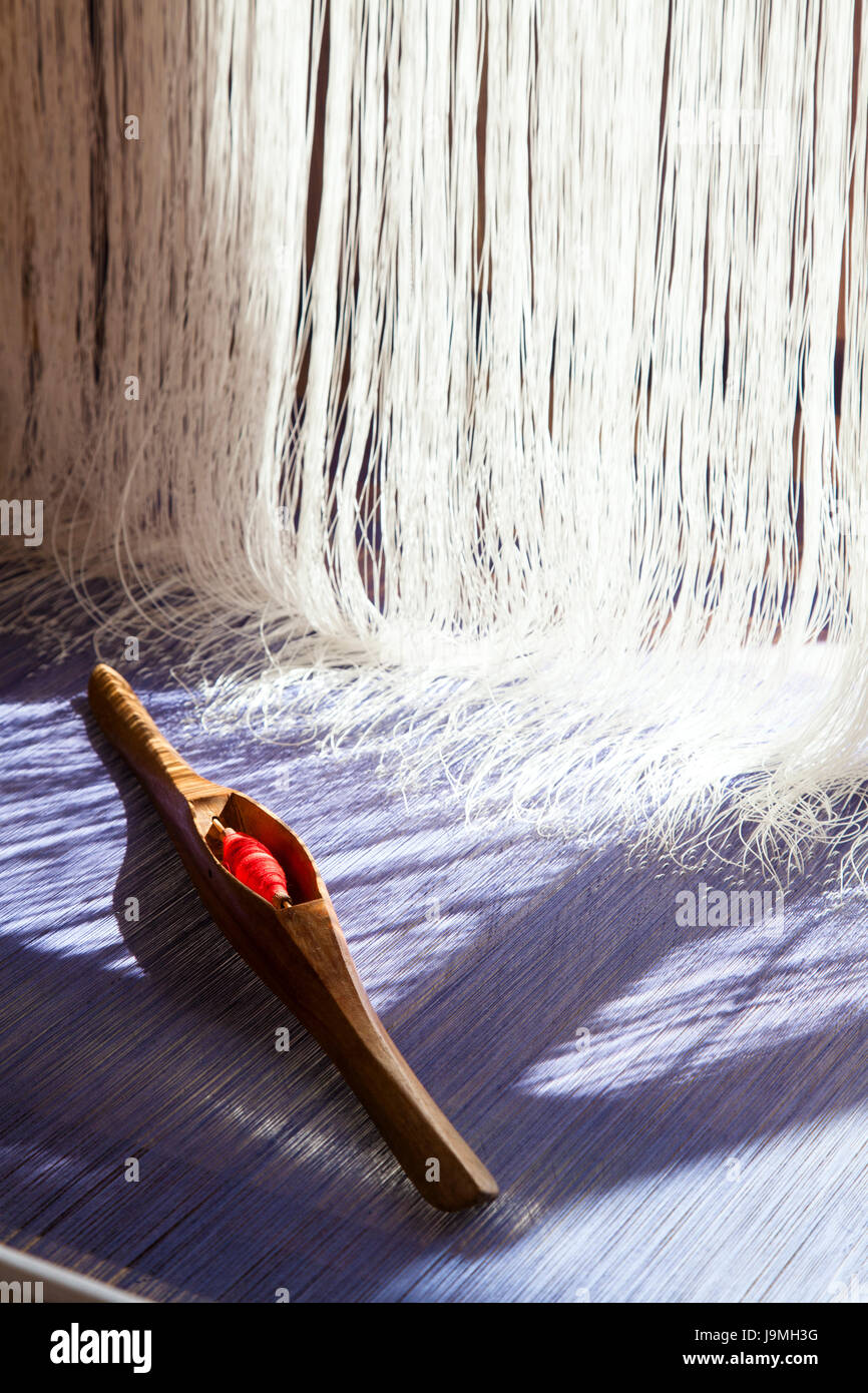 Yarn background, old weaving Loom and thread of yarn. A traditional ...