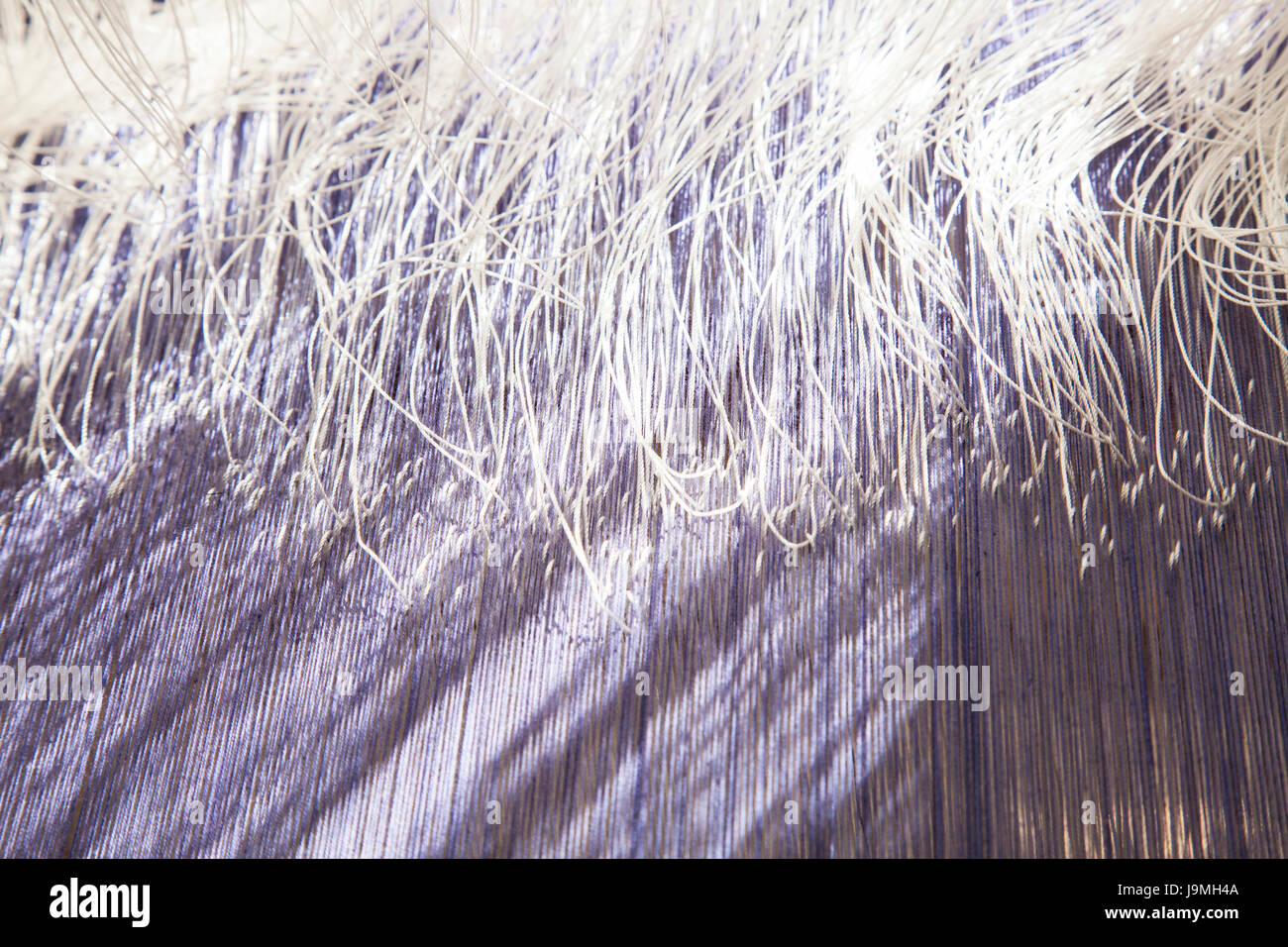 Yarn background, old weaving Loom and thread of yarn. A traditional ...
