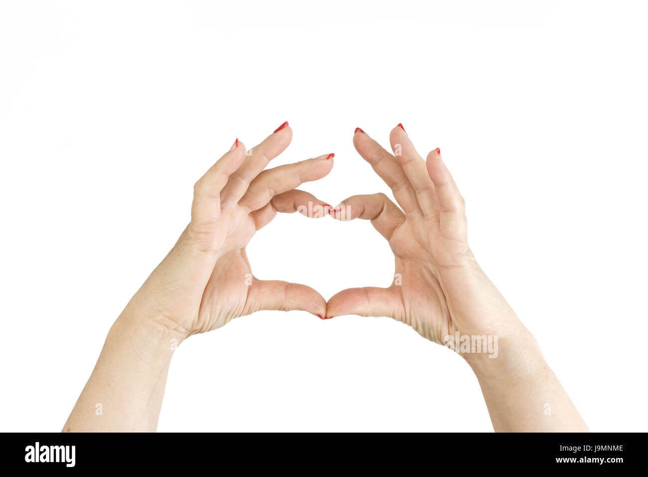 Two hands in form of heart isolated on white background. Woman hands ...