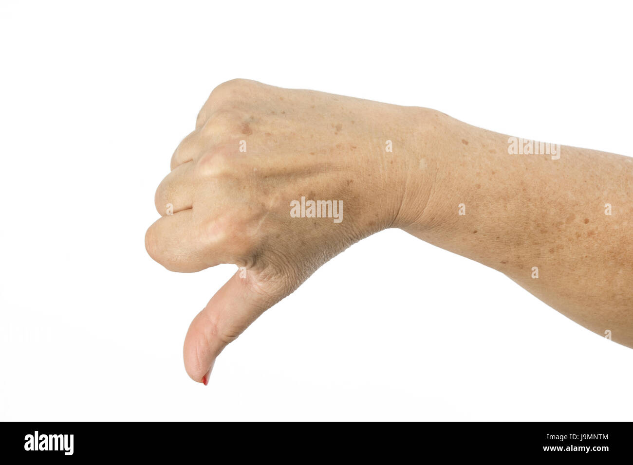 Woman hand thumb down isolated on white background. Female finger down ...