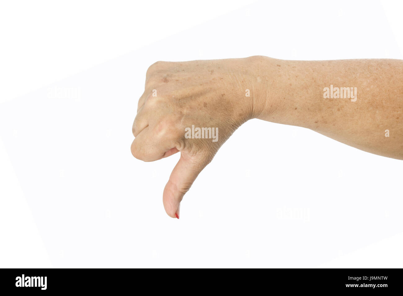 Thumb down woman hand gesture isolated on white background. Negative ...
