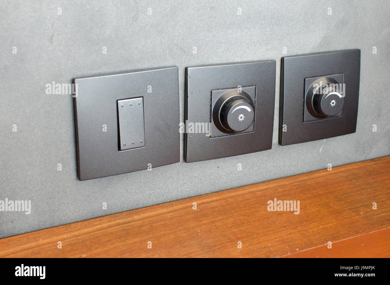 light electrical switch with wall background Stock Photo - Alamy