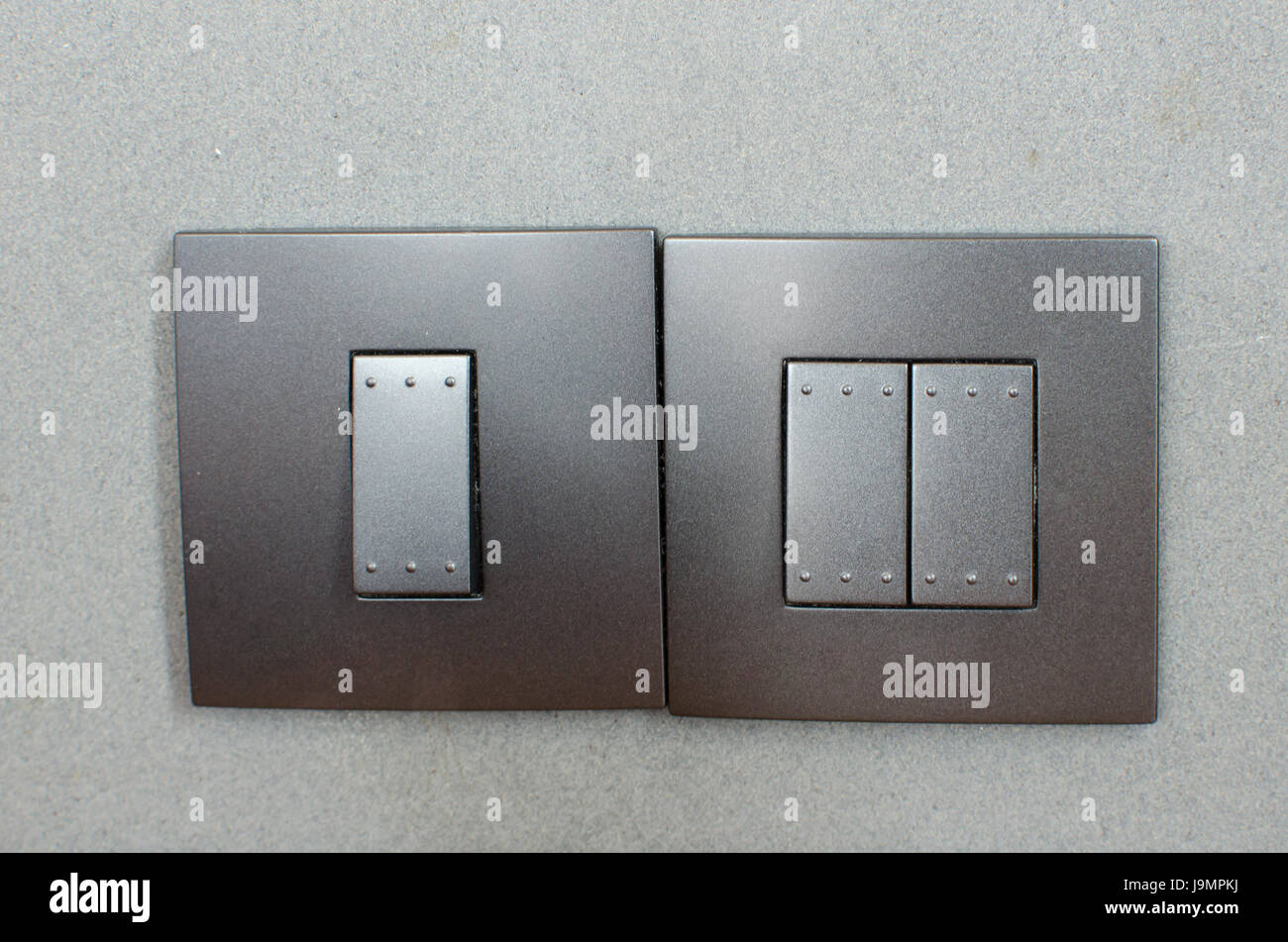 light electrical switch with wall background Stock Photo - Alamy