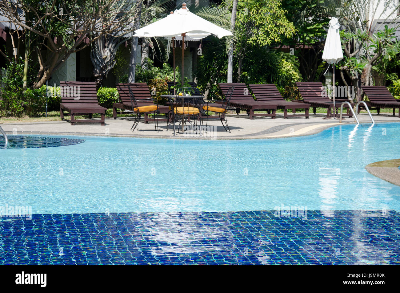 Swimming pool of luxury resort Stock Photo - Alamy