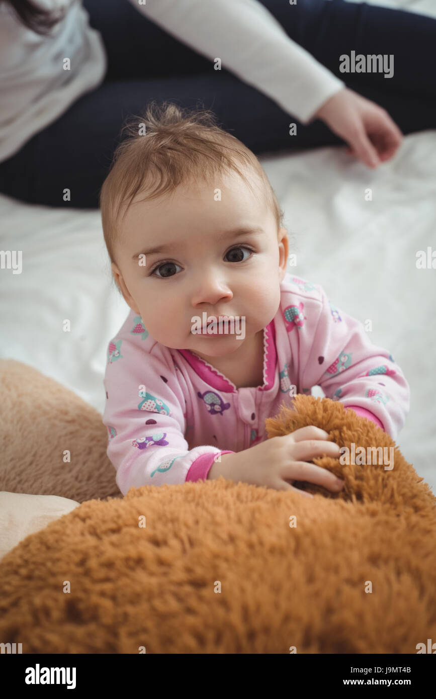 Baby playing teddy bear hi-res stock photography and images - Alamy