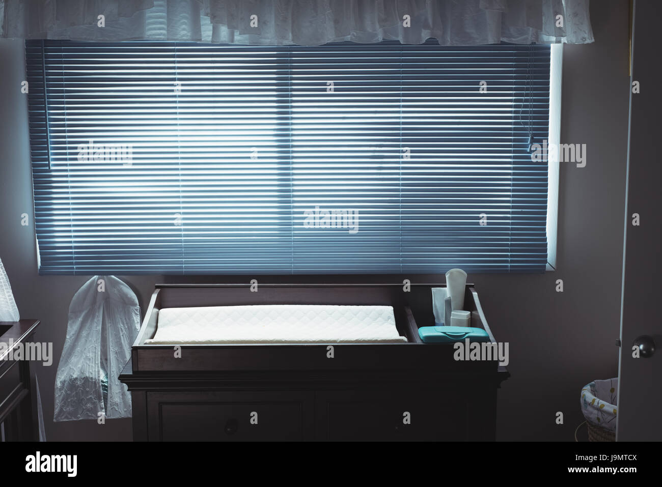 Empty wooden cot in bedroom at home Stock Photo - Alamy