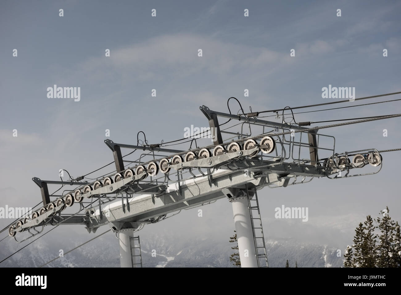 Electrical surface lift pole in ski resort Stock Photo - Alamy