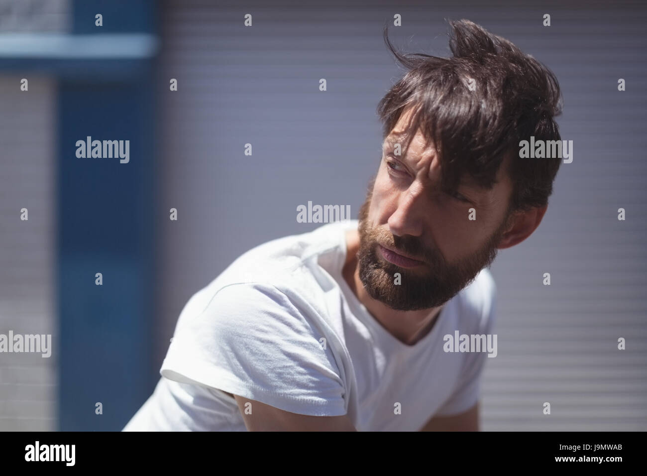 Man Looking Over Shoulder