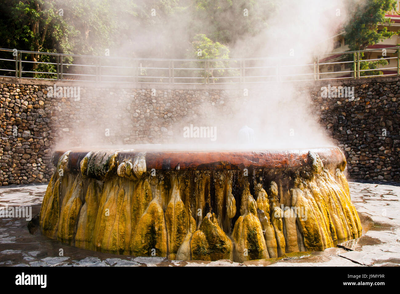 volcanic natural hot spring mineral water pool with steam spa and sun ...