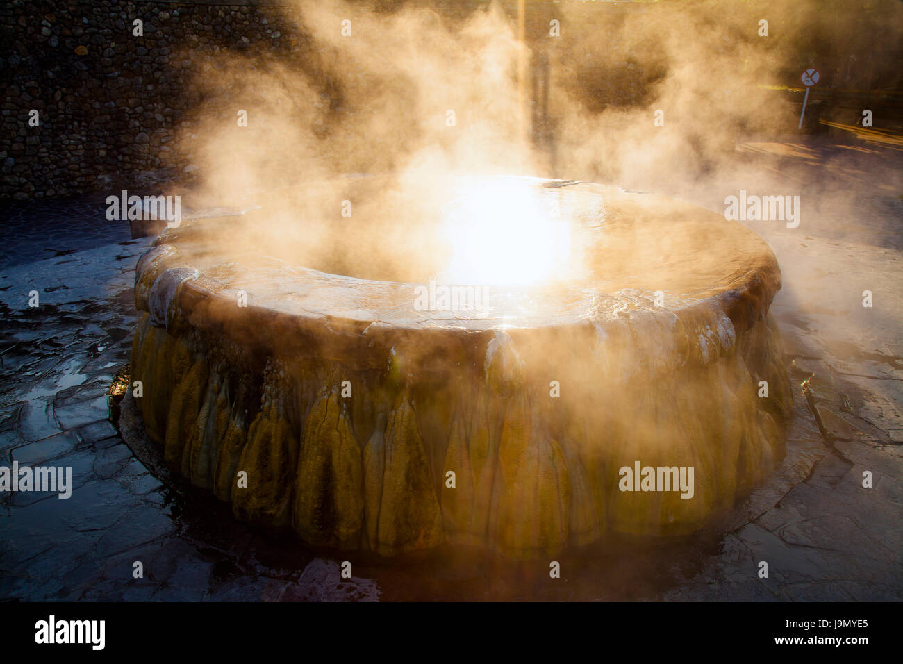volcanic natural hot spring mineral water pool with steam spa and sun ...