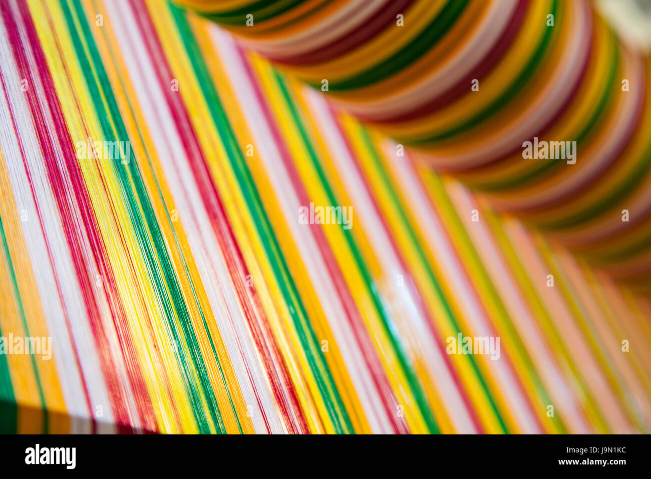 Yarn background, old weaving Loom and thread of yarn. A traditional ...