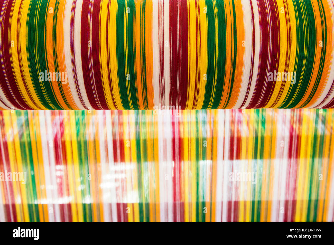 Yarn background, old weaving Loom and thread of yarn. A traditional ...