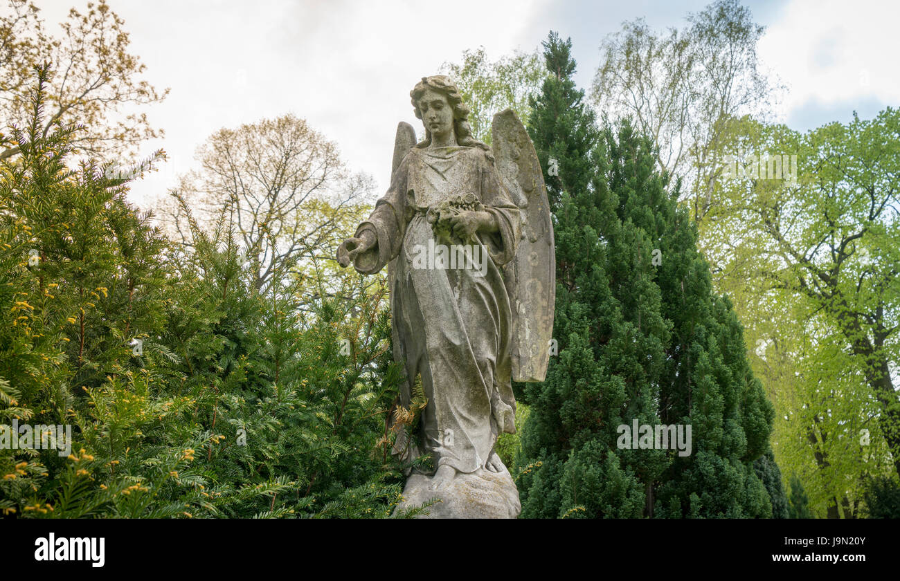 old sculpture of an angel in nature. Unknown artist of the 19th Stock ...