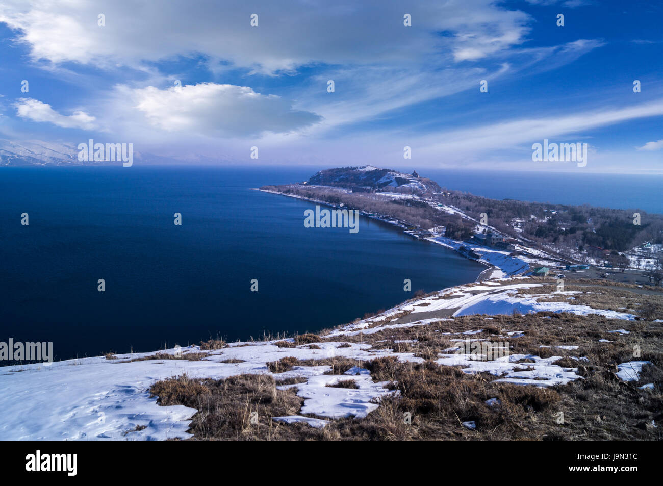view on island in Sevan lake in winter Stock Photo - Alamy