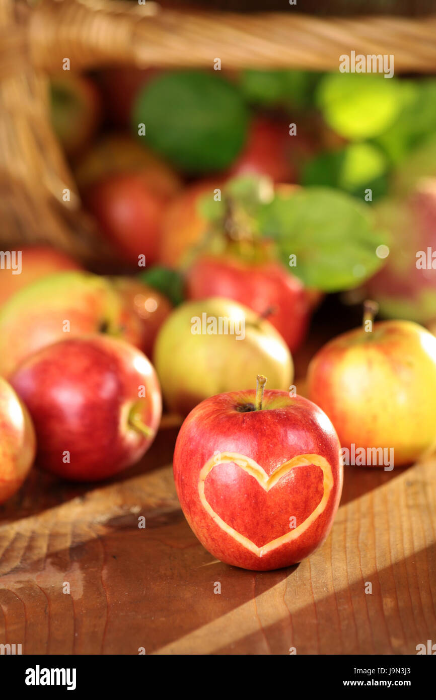 basket with apples on a wet table Stock Photo - Alamy