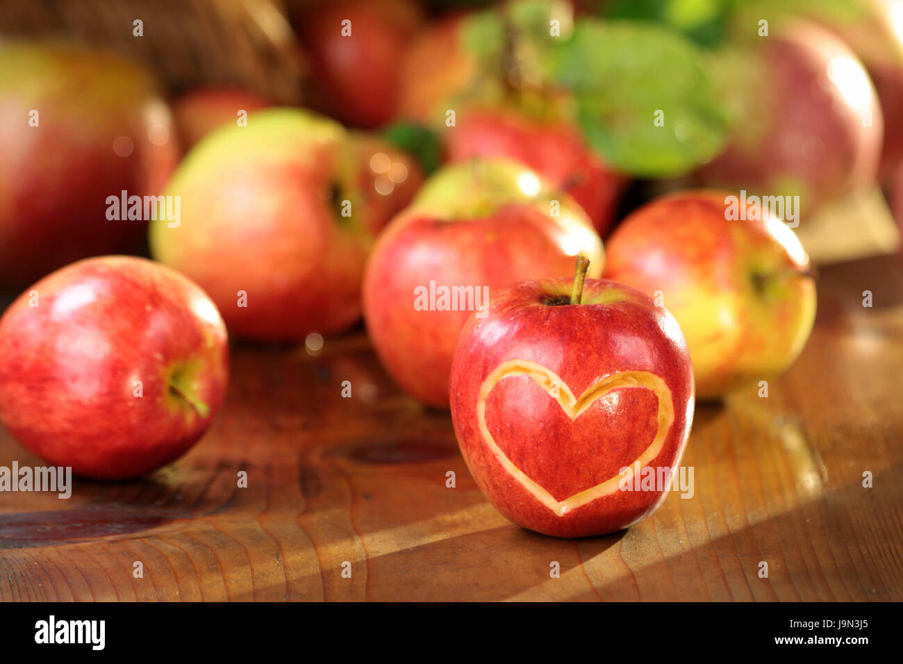 apple heart on a wet table Stock Photo - Alamy