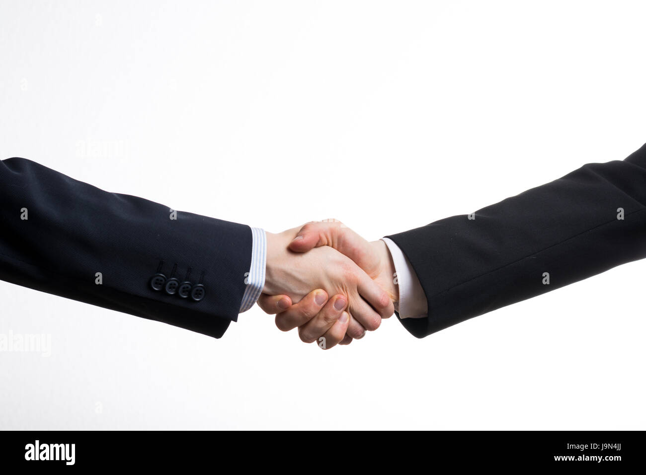 Business handshake isolated on white background from the side Stock ...
