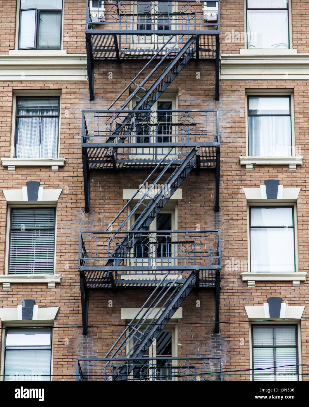 Wrought iron fire escape hi-res stock photography and images - Alamy