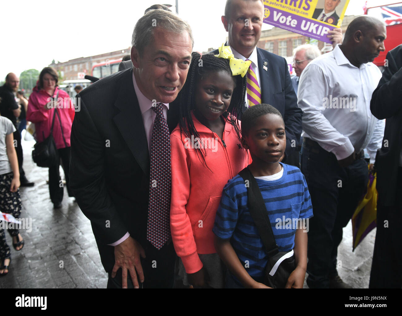 Former Ukip leader Nigel Farage and local candidate Peter Harris ...