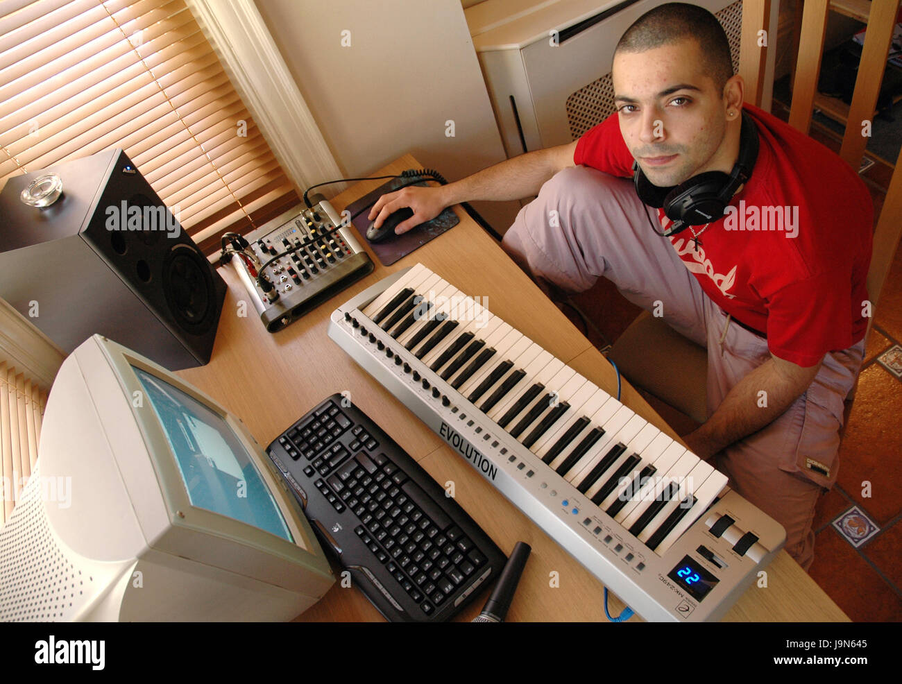 Musician/Rapper with keyboard and computer Stock Photo - Alamy