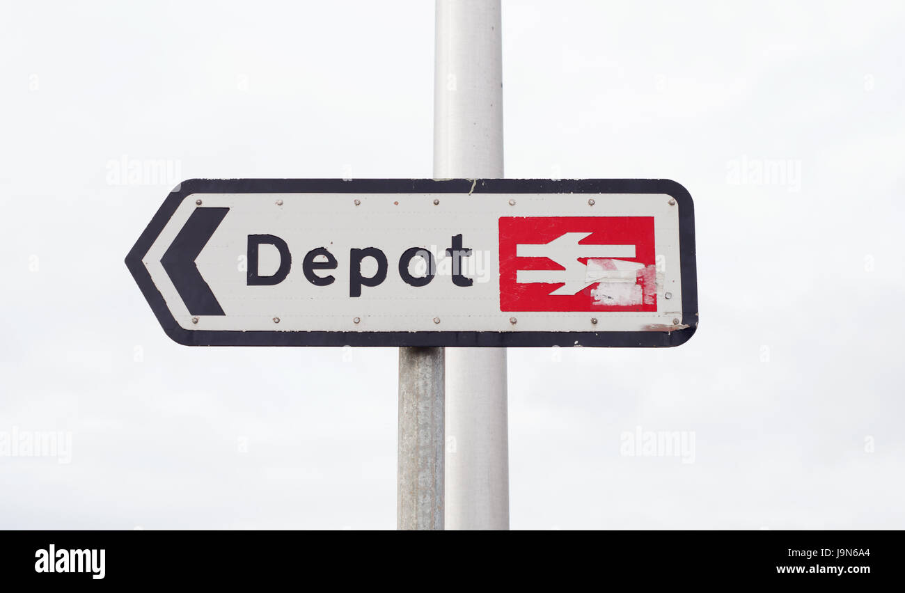 Sign to railway depot with incorrectly oriented British Rail logo ...