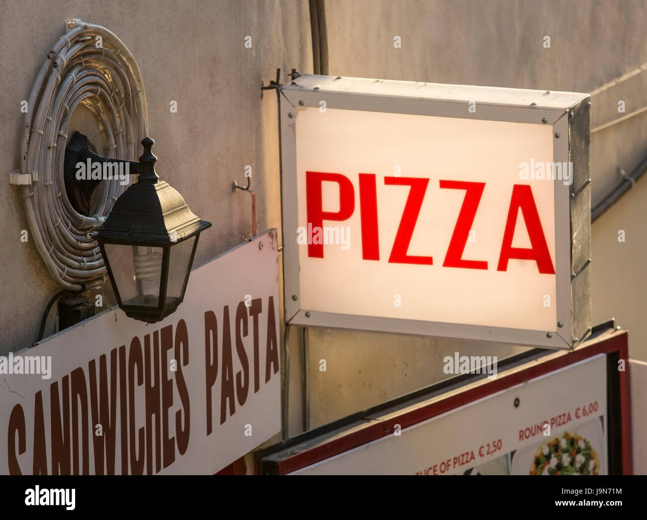 Illuminated pizza sign in Rome, Italy, Europe Stock Photo - Alamy