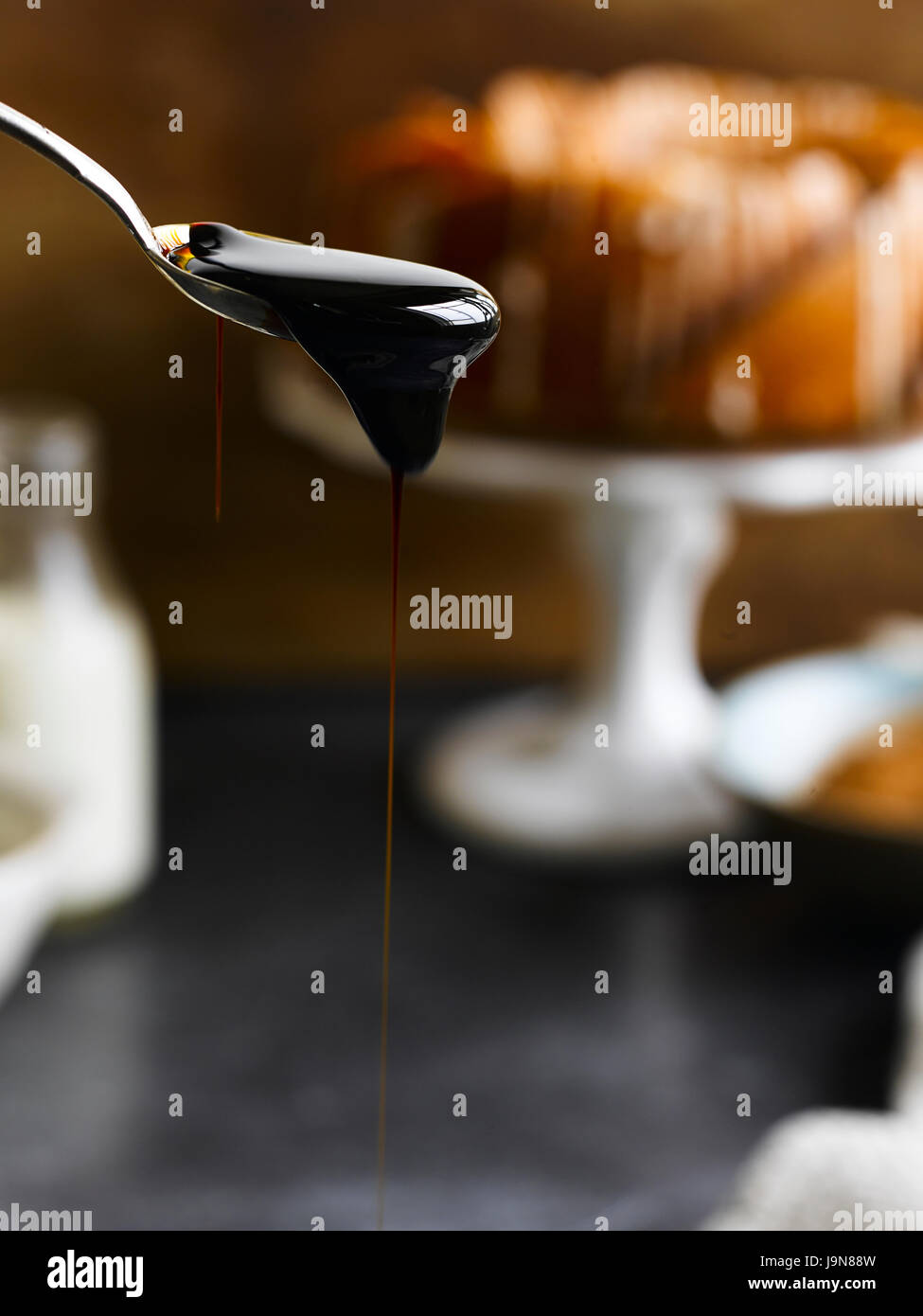 Treacle Drip Food Photography Stock Photo - Alamy