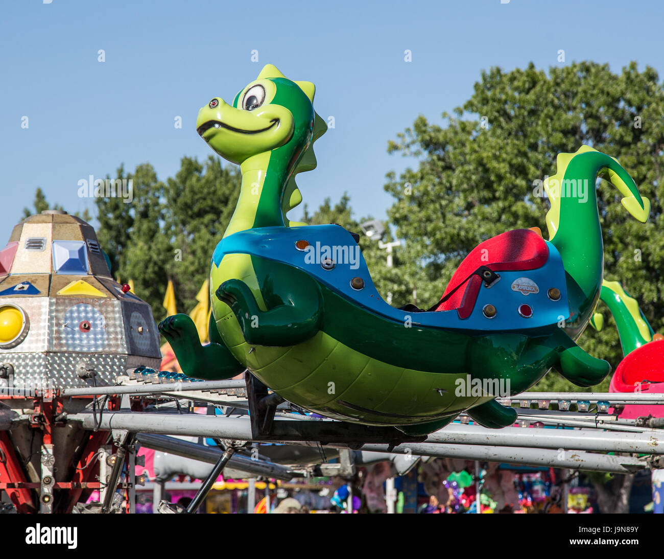 Children's rides at the county fair Stock Photo - Alamy