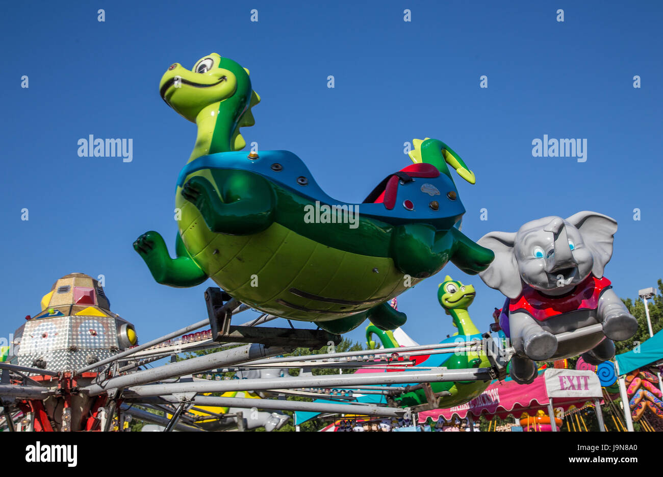 Children's rides at the county fair Stock Photo - Alamy