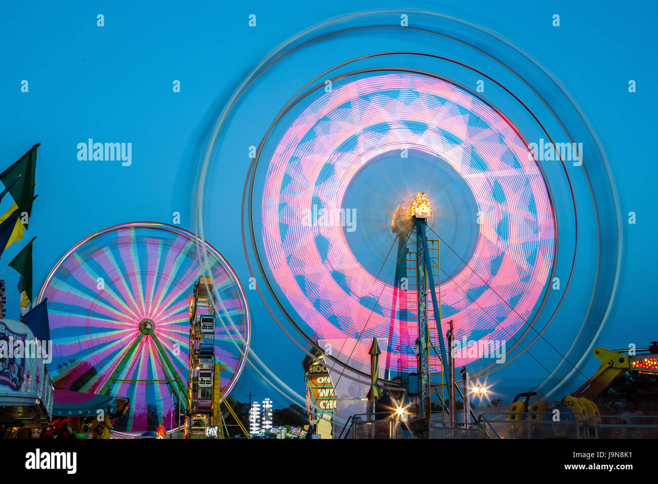 Popular rides at the county fair Stock Photo - Alamy