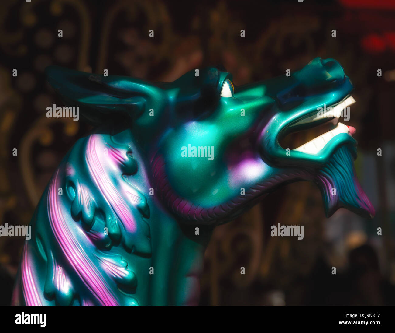 Merry go round animals at the county fair Stock Photo - Alamy