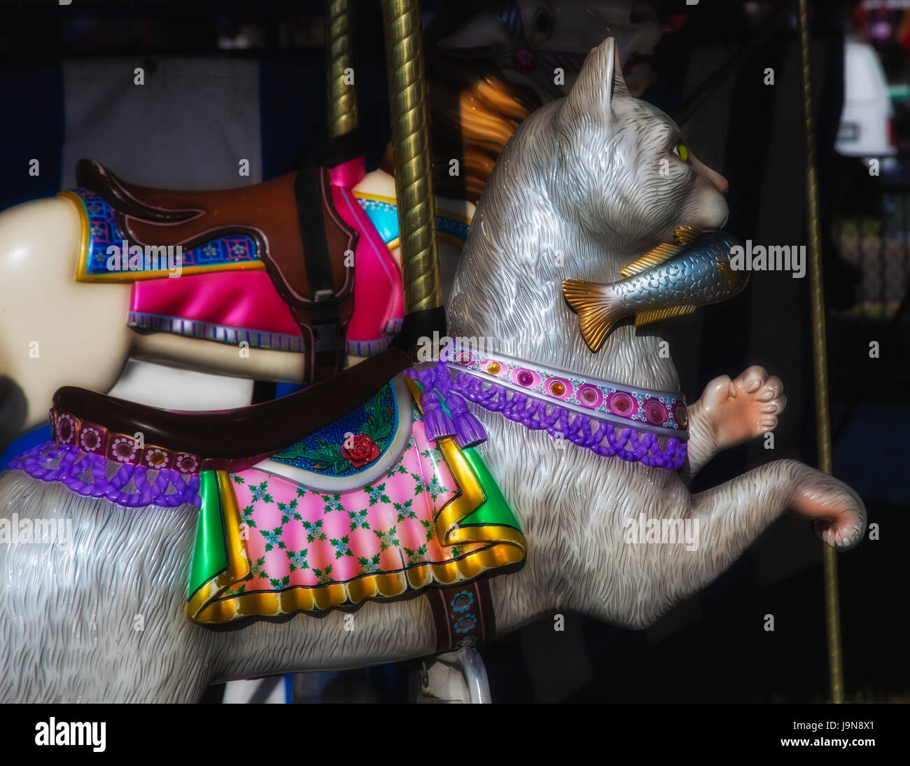 Merry go round animals at the county fair Stock Photo - Alamy