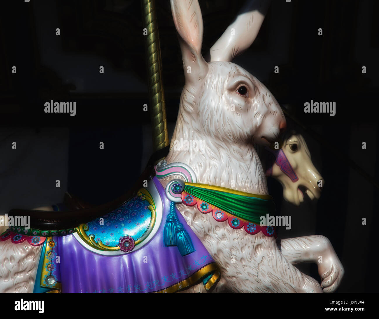 Merry go round animals at the county fair Stock Photo - Alamy