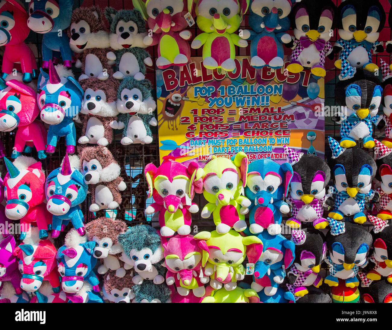 Prizes on the midway at the county fair Stock Photo - Alamy