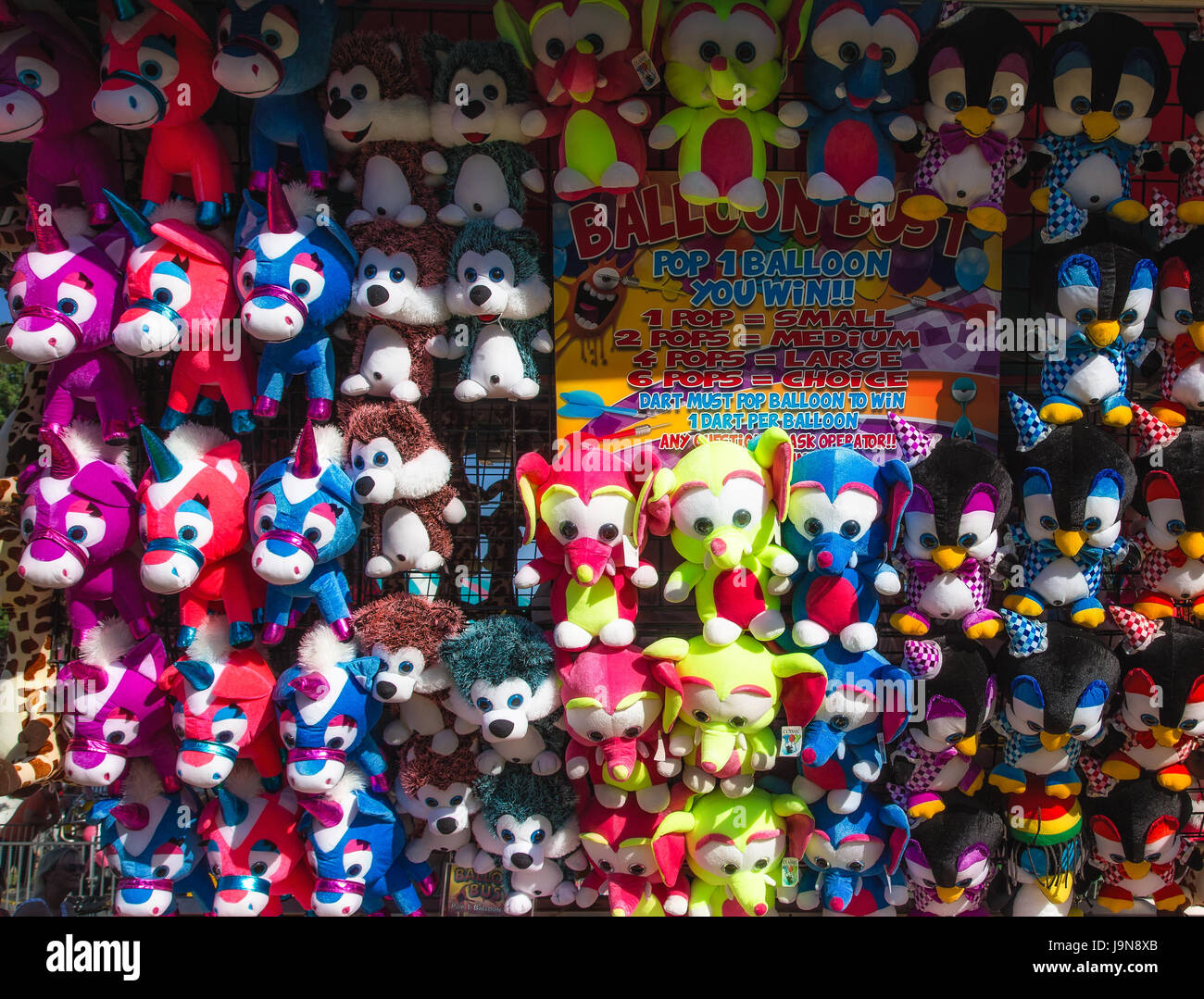Prizes on the midway at the county fair Stock Photo - Alamy