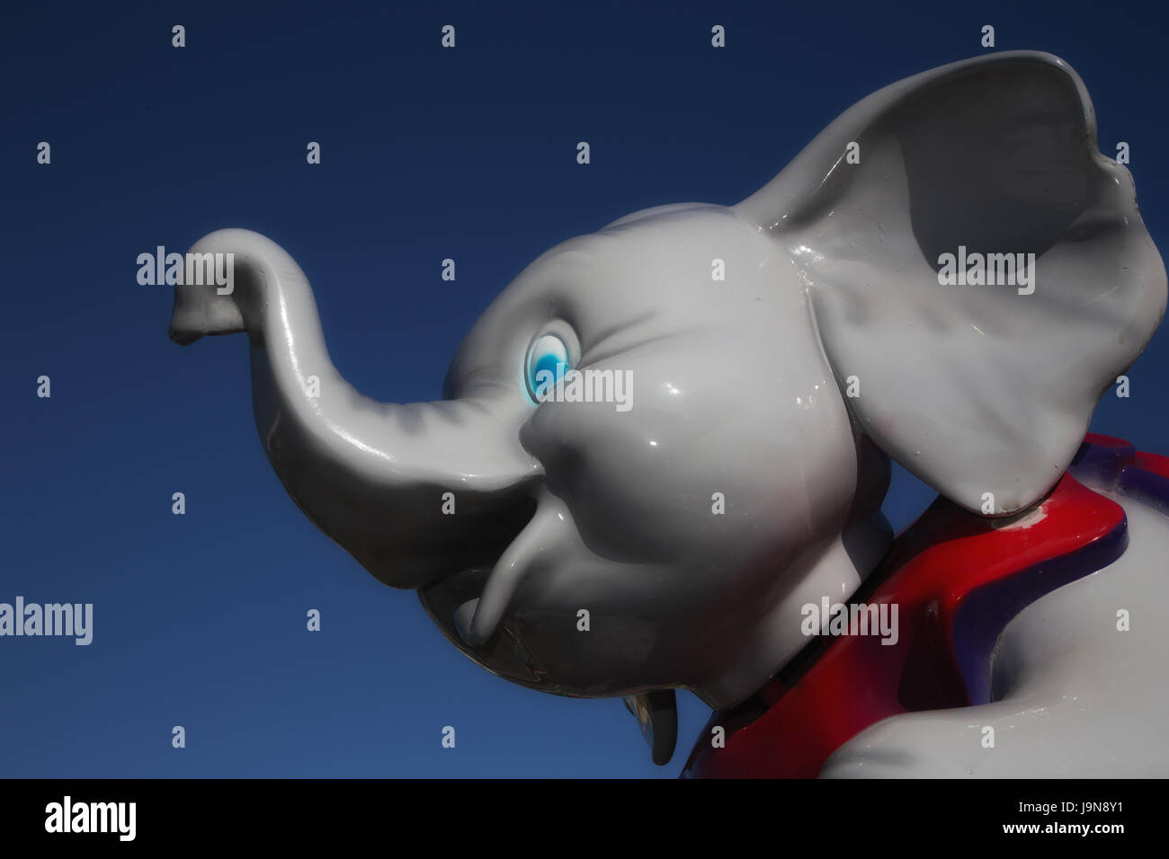 Flying elephant ride at the county fair Stock Photo - Alamy