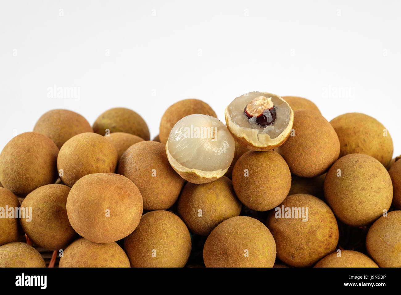 Fresh longan fruit on white background Stock Photo - Alamy