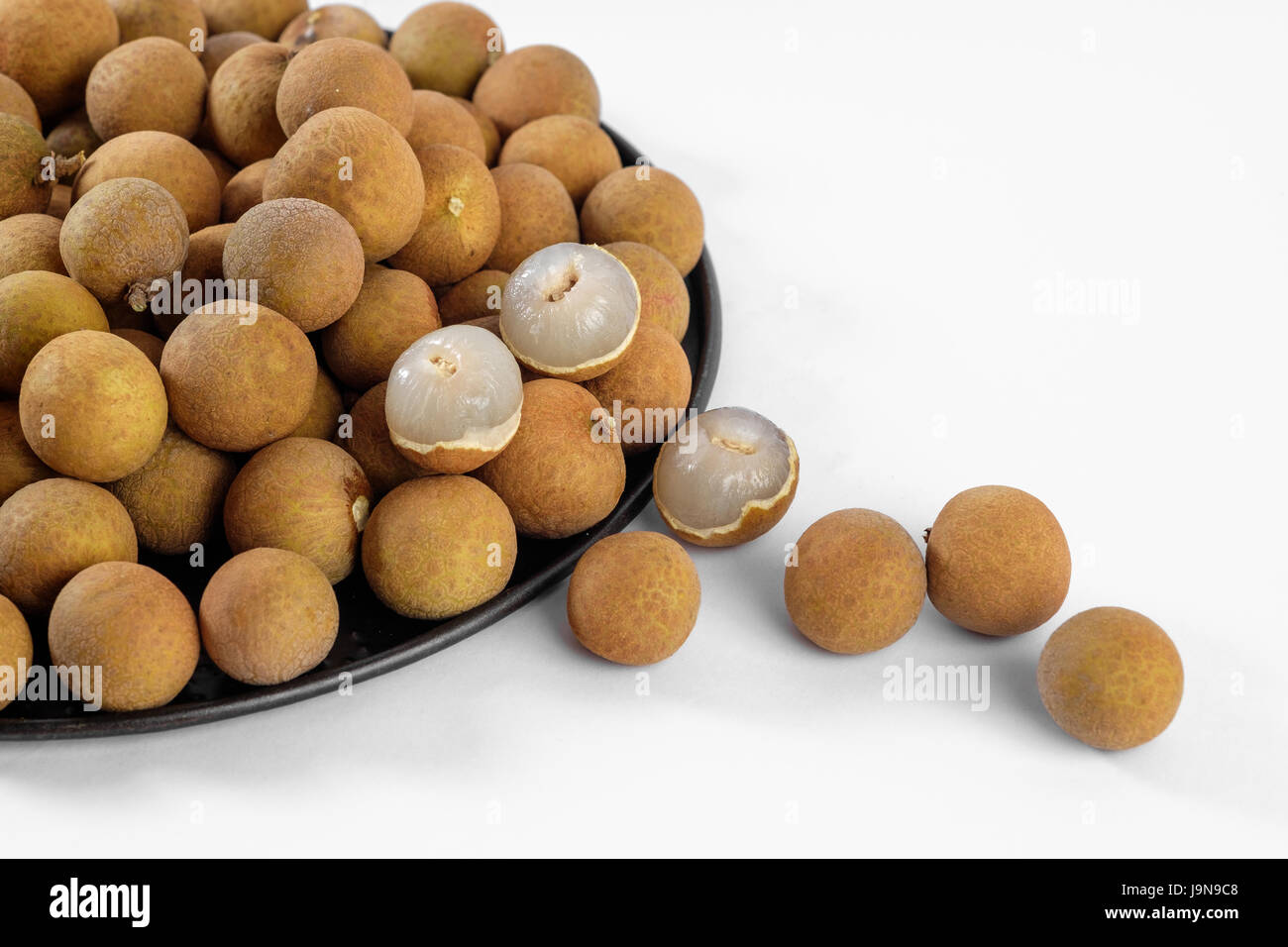 Fresh longan fruit on white background Stock Photo - Alamy