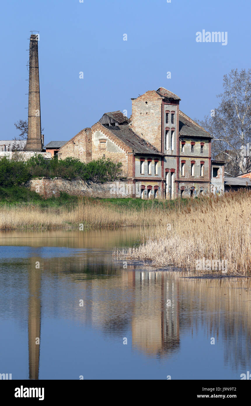 old ruined factory on lake Stock Photo - Alamy