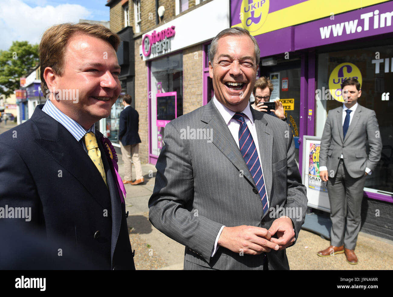 Former Ukip leader Nigel Farage with the party's local candidate Tim ...