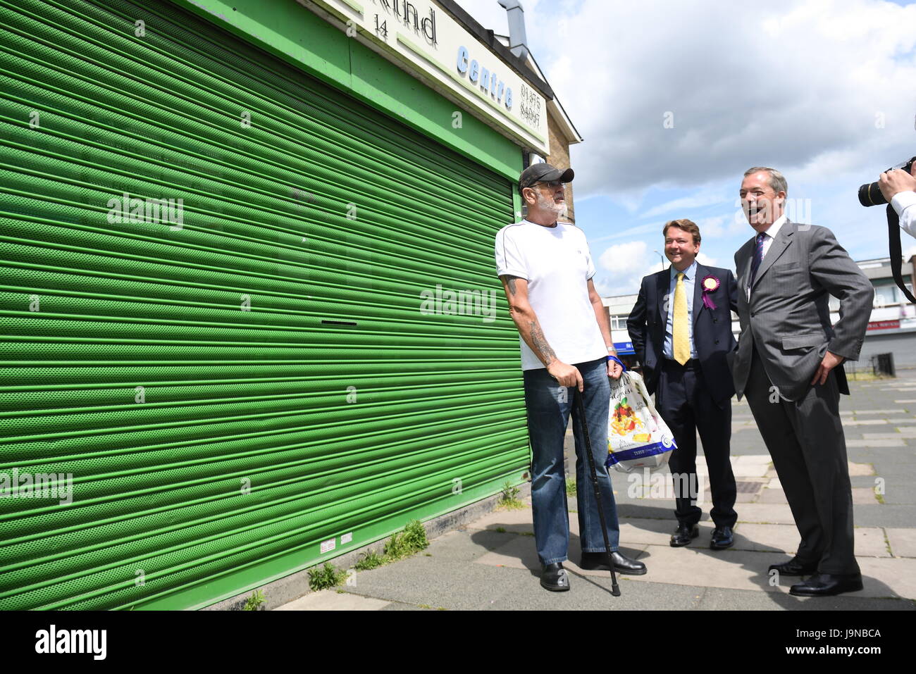 Former Ukip leader Nigel Farage (right) and the party's local candidate ...