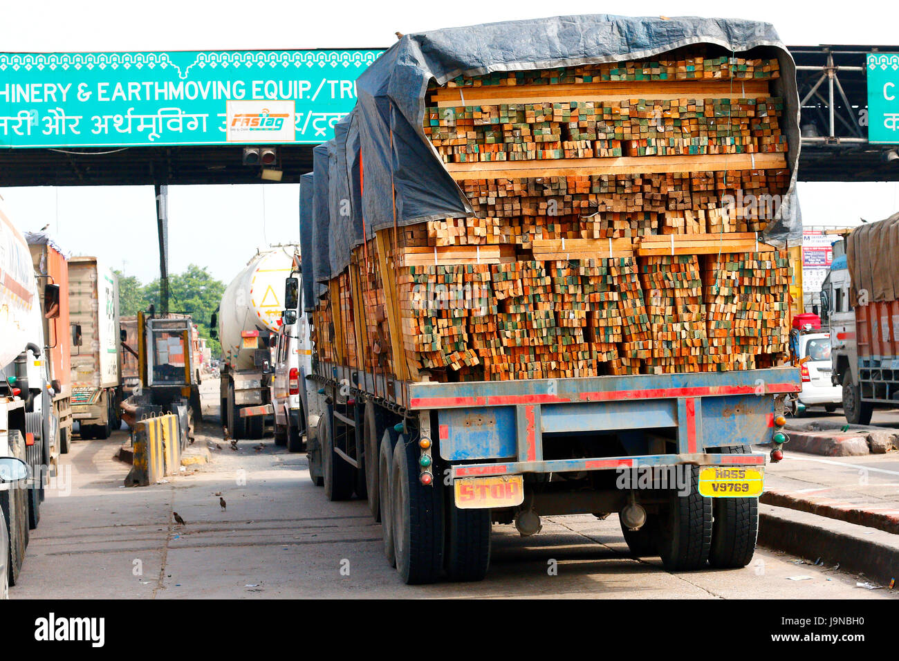Truck transporting wood blocks Stock Photo - Alamy