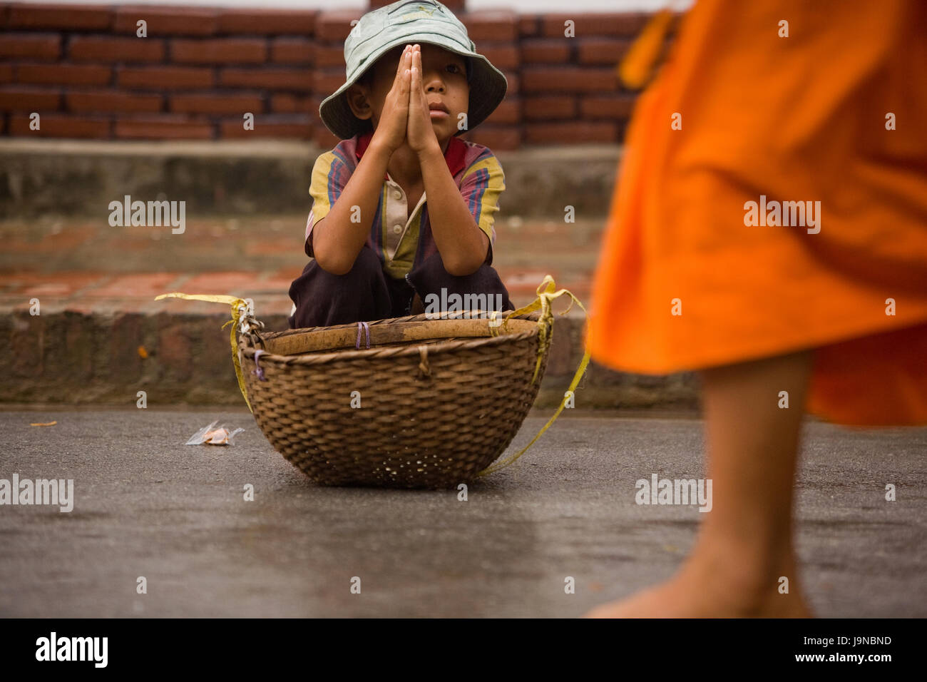 Luang Prabang, Laos - July 25, 2008 : Monk Alms Giving Procession.Every ...