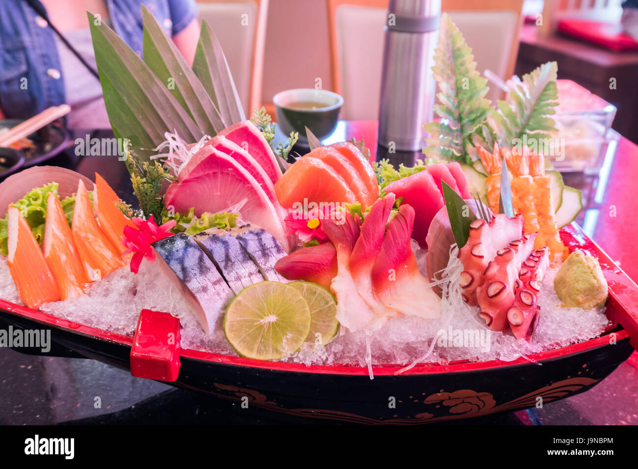 Sea food set with mix fish and squid shellfish on ice. Original or ...