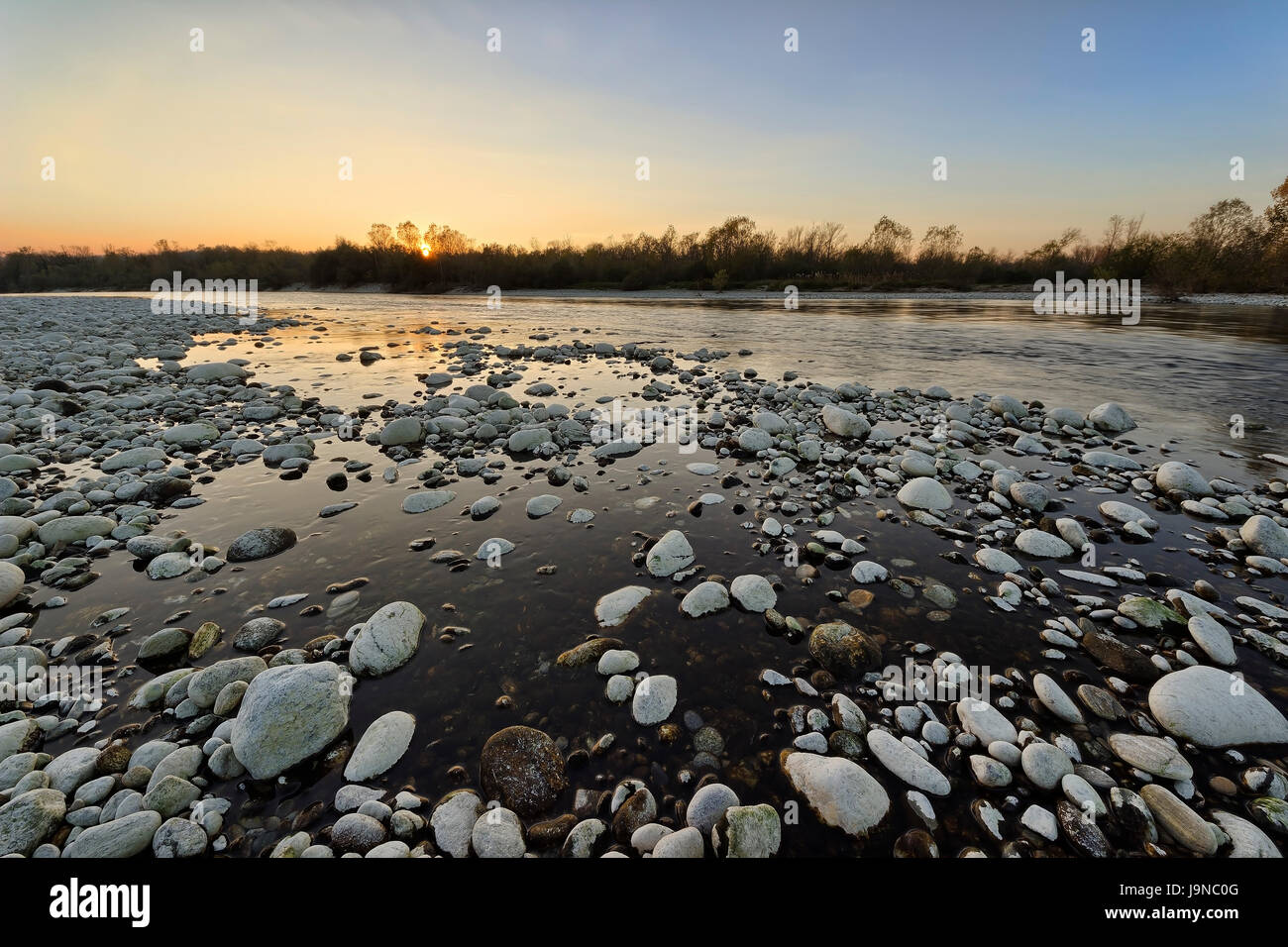 Sunset at the Ticino river, Italy Stock Photo - Alamy