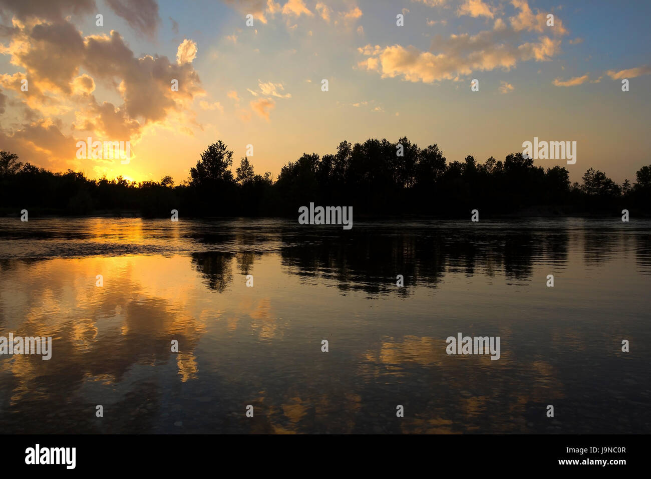 Sunset at the Ticino river, Italy Stock Photo - Alamy